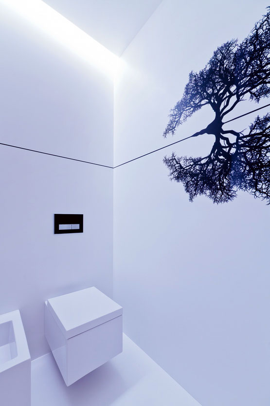 Modern White Square Toilet with Recessed Ceiling Light - My Home Deco Mag